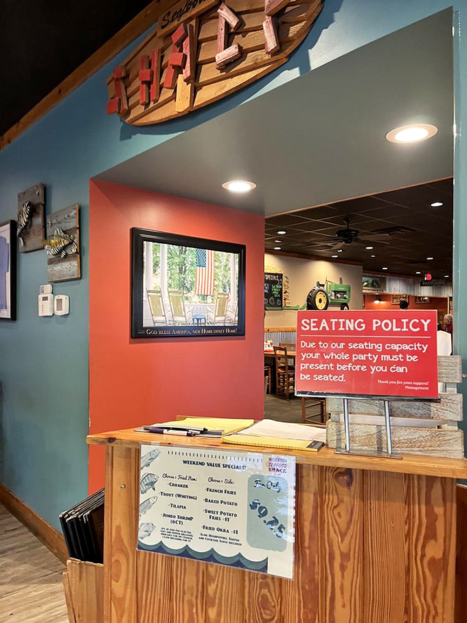 The entrance tells you everything&mdash;nautical d&eacute;cor, clear rules, and the promise of seafood worth waiting for.