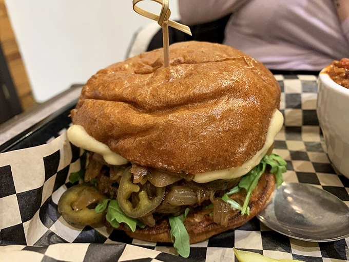 A towering house burger that defies gravity and expectations&mdash;proof that vegetarian doesn't mean settling for less.