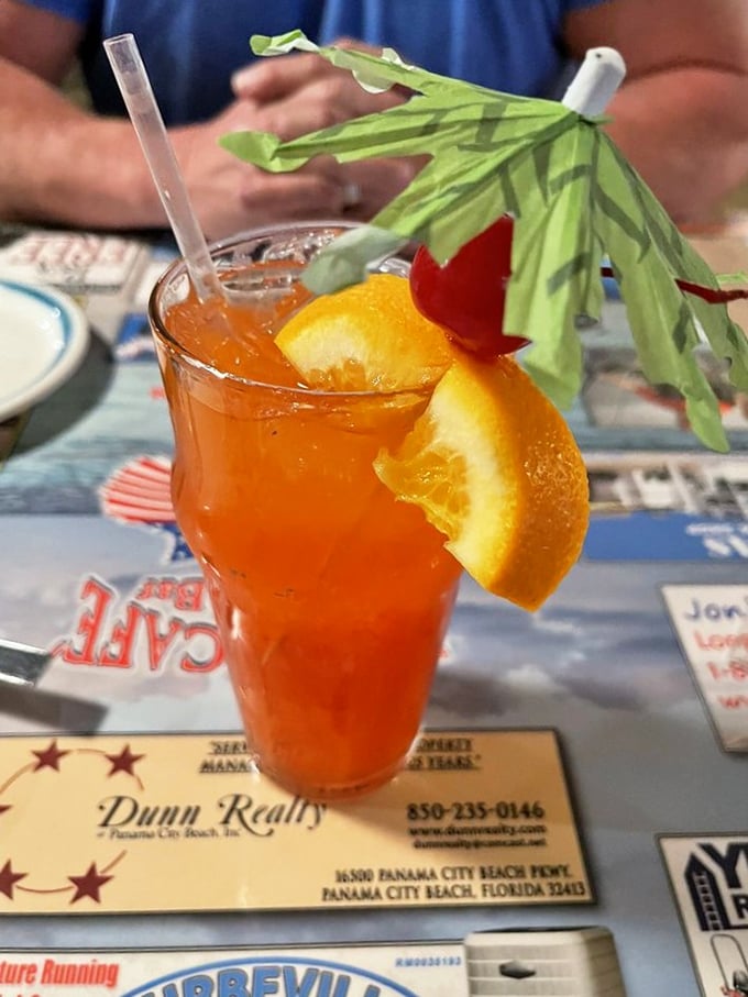 This hurricane cocktail isn't just a drink—it's a tropical vacation in a glass, complete with its own tiny paper palm tree.