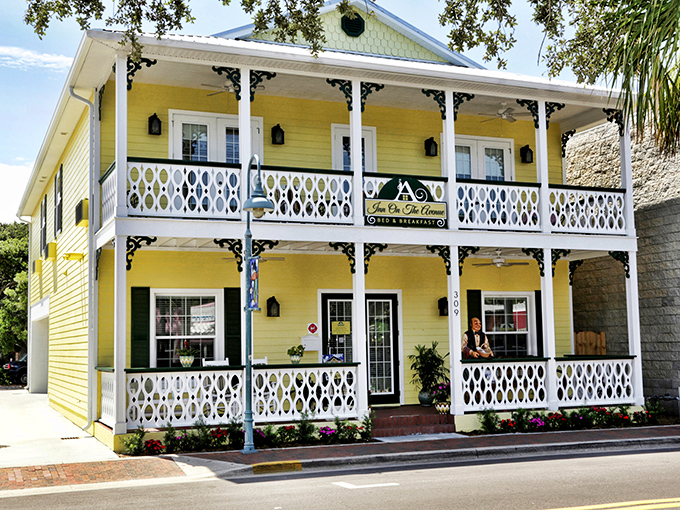 Sunshine yellow with classic white trim, the Inn On The Avenue embodies Florida charm. This two-story beauty offers a front-row seat to New Smyrna's vibrant street life.