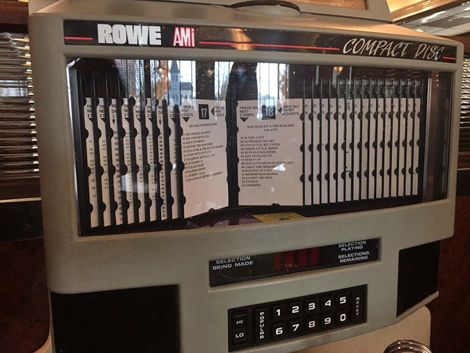 The jukebox&mdash;a musical time machine offering everything from Sinatra to Springsteen. Three quarters and suddenly everyone's singing along to "Sweet Caroline."