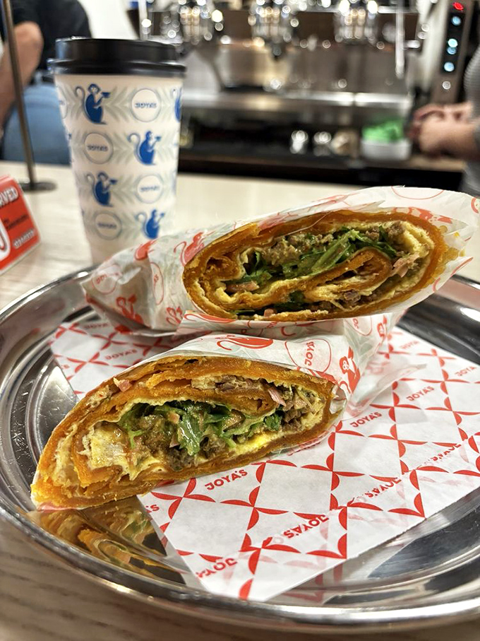 The Kati Roll, where egg meets filling in a perfect handheld package, proving the best food doesn't always require a fork.