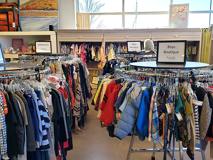 The children's section: where parents discover adorable outfits their kids will wear exactly once before outgrowing or decorating with spaghetti sauce.