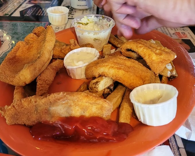 Lake Erie perch dinner: proof that sometimes the best things in life are breaded, fried, and served with three dipping sauces.