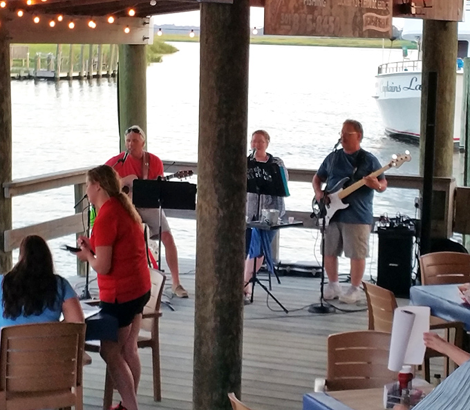 Live music on the deck&mdash;because fresh seafood, cold drinks, and local tunes are the holy trinity of summer in Delaware.