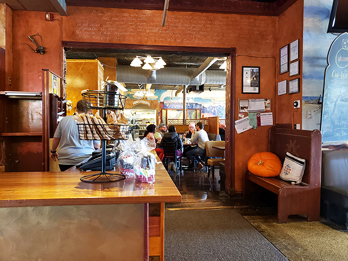 The entryway offers a glimpse into the warm buzz beyond – that perfect moment of anticipation before a great meal begins.