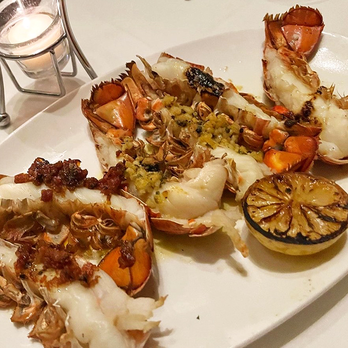 Lobster prepared three ways is never excessive—it's research. The charred lemon adds that perfect touch of chef-y sophistication.