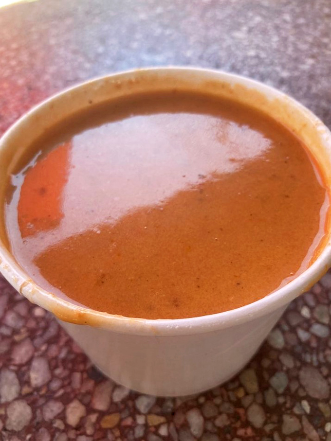 This lobster bisque isn't just soup&mdash;it's liquid luxury in a humble cup. The color alone tells you there's been no cutting of corners, only shellfish transformed into silky perfection.