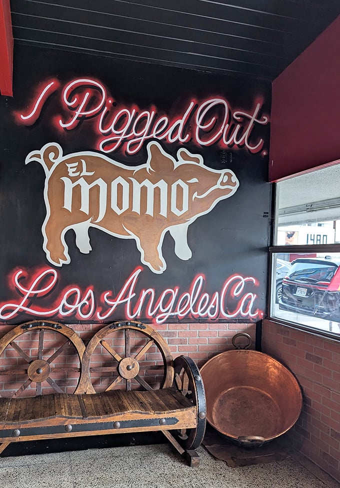 "I Pigged Out" proclaims the neon sign, next to the copper cazo that makes the magic happen. Not just decoration&mdash;it's truth in advertising.