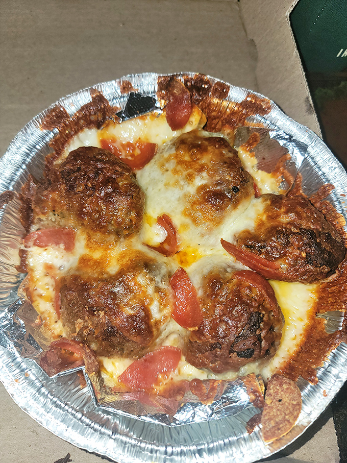 These aren't just meatballs&mdash;they're flavor planets orbiting in a galaxy of melted cheese and sauce. One small step for man, one giant leap for your taste buds.