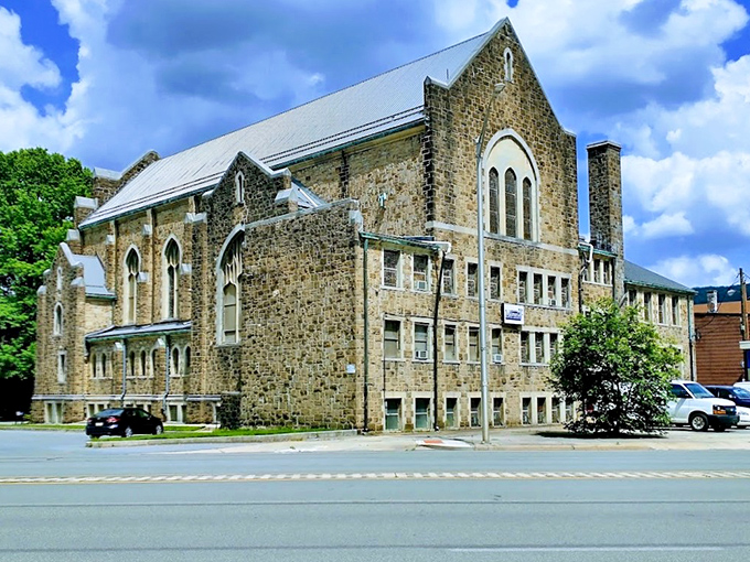 Stone churches like this stand as architectural anchors throughout Johnstown, offering both spiritual community and historical grandeur without the big-city price tag.