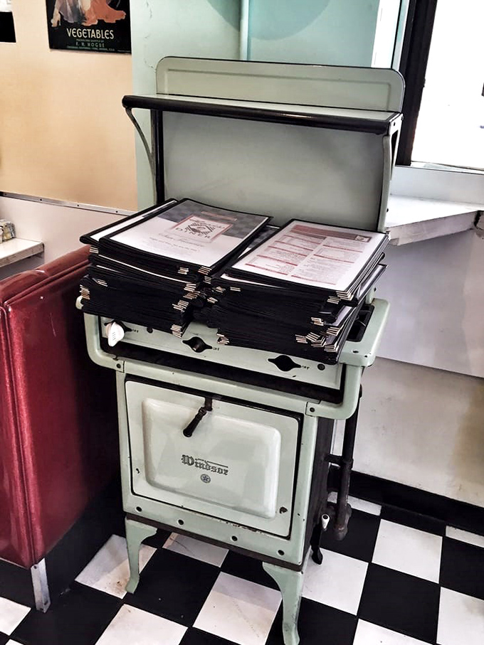 Even the menu stand is a blast from the past. In a world of digital everything, there's something deliciously rebellious about physical menus.