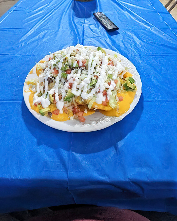 Nachos on a blue tablecloth under the California sun. Some moments are so perfect they make you wonder why you ever eat indoors.