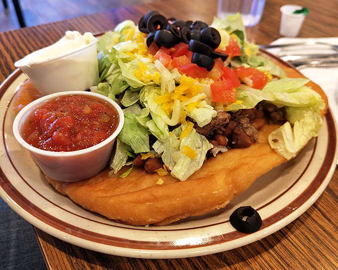 The Navajo taco transforms a simple fry bread into a canvas for southwestern artistry. Each topping adds another layer to the story.