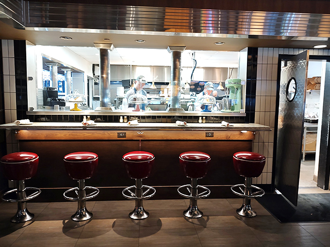 The open kitchen lets you witness culinary magic in action &ndash; dinner and a show without the awkward community theater acting.