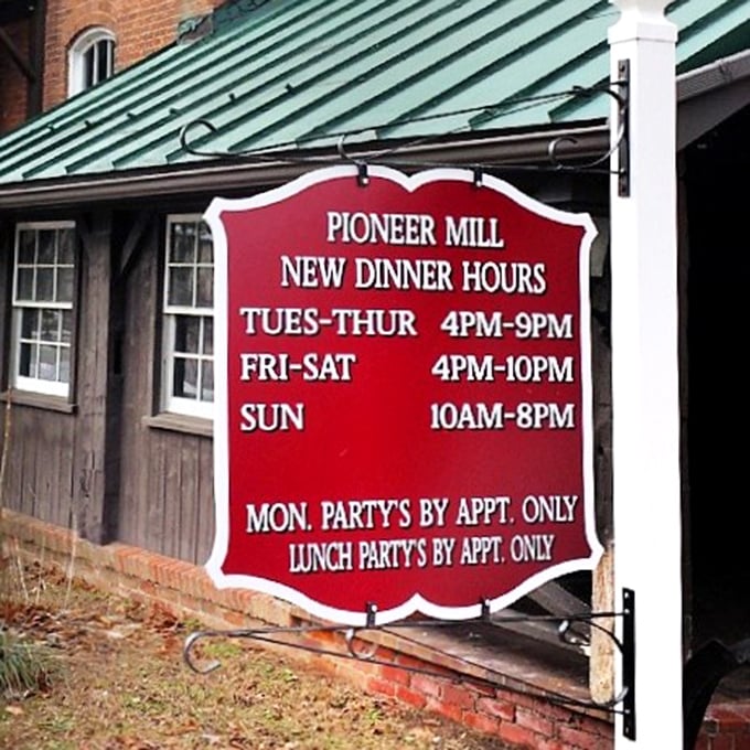 Operating hours displayed with small-town charm. The kind of sign that says, "Yes, we're serious about food, but not about ourselves."