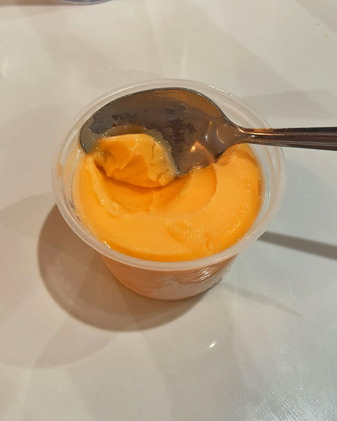 A cup of orange sherbet&mdash;the perfect palate cleanser between buffet rounds or the refreshing finale to an epic feast.