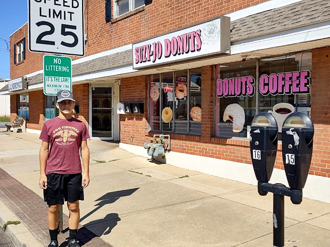 Outside Suzy-Jo's, where the speed limit sign might as well read "25 mph&mdash;unless you're rushing home to enjoy your donuts while they're fresh."