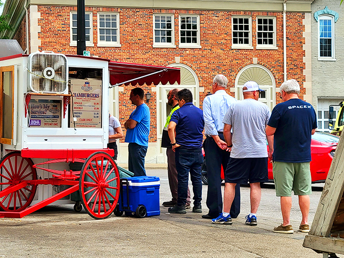 The universal language of waiting in line for something extraordinary. These gentlemen know that patience leads to burger paradise.
