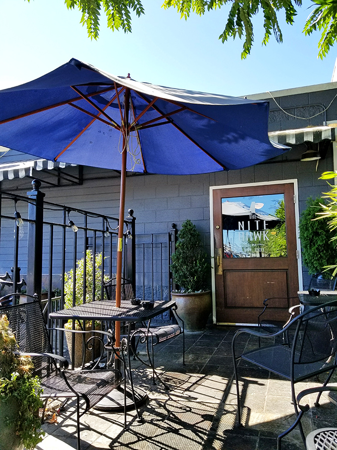 The outdoor patio—where summer brunches stretch into afternoon conversations and Portland's rare sunny days are properly celebrated with friends.