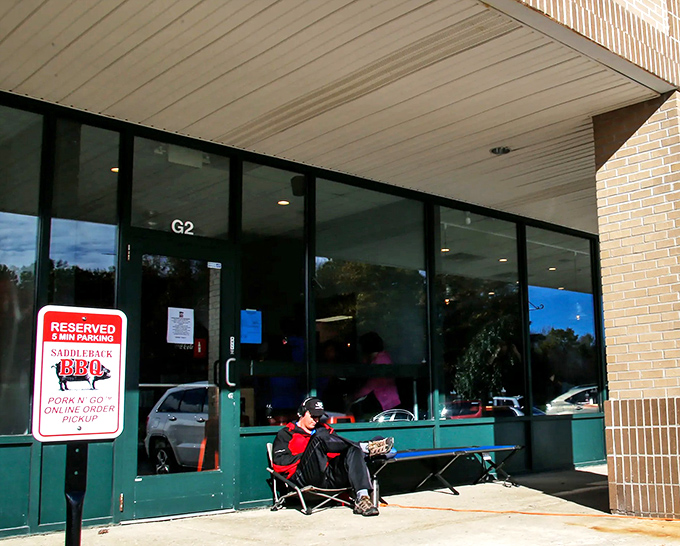 Even in Michigan's unpredictable weather, dedicated barbecue fans will wait outside. Some pleasures are worth a little patience.