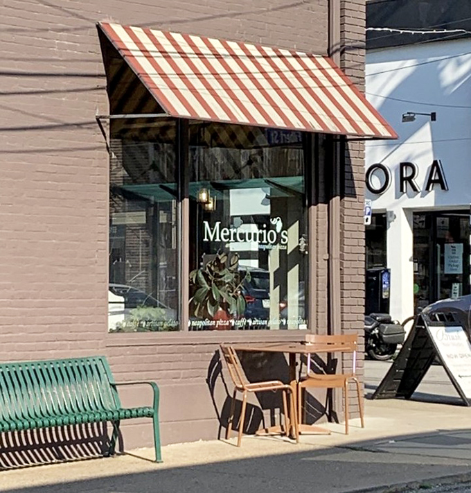 Those outdoor seats aren't just furniture; they're front-row tickets to people-watching with a side of authentic Italian cuisine.