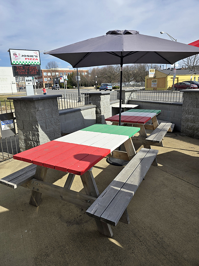 Picnic tables painted in festive Italian flag colors offer outdoor seating for those perfect Ohio days when pizza tastes even better outside.