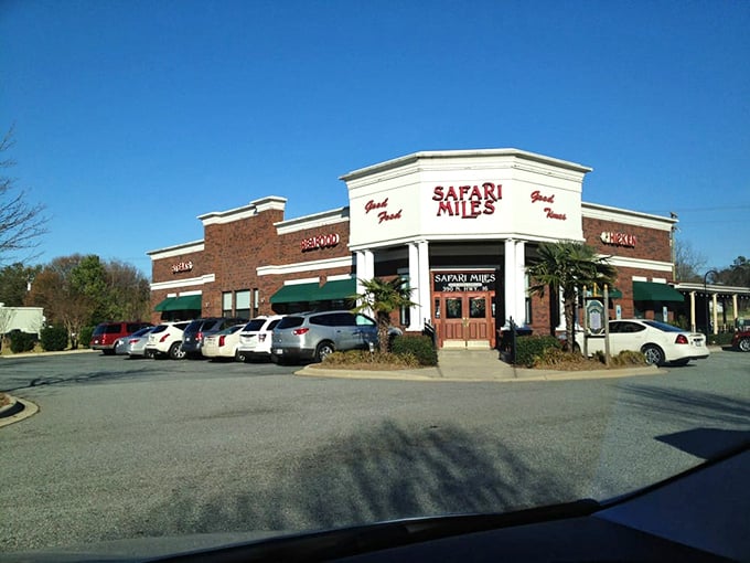 Safari Miles' distinctive exterior stands as a beacon for hungry travelers, promising refuge from chain restaurant mediocrity and a return to real, satisfying food.