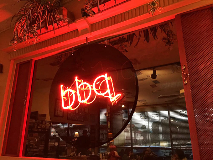 That glowing BBQ sign beckons like a lighthouse guiding hungry souls to their ultimate comfort food destination.