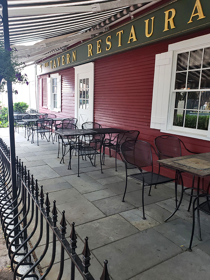 The outdoor patio offers al fresco dining against the restaurant's distinctive red exterior&mdash;a perfect spot for people-watching on pleasant Pennsylvania days.