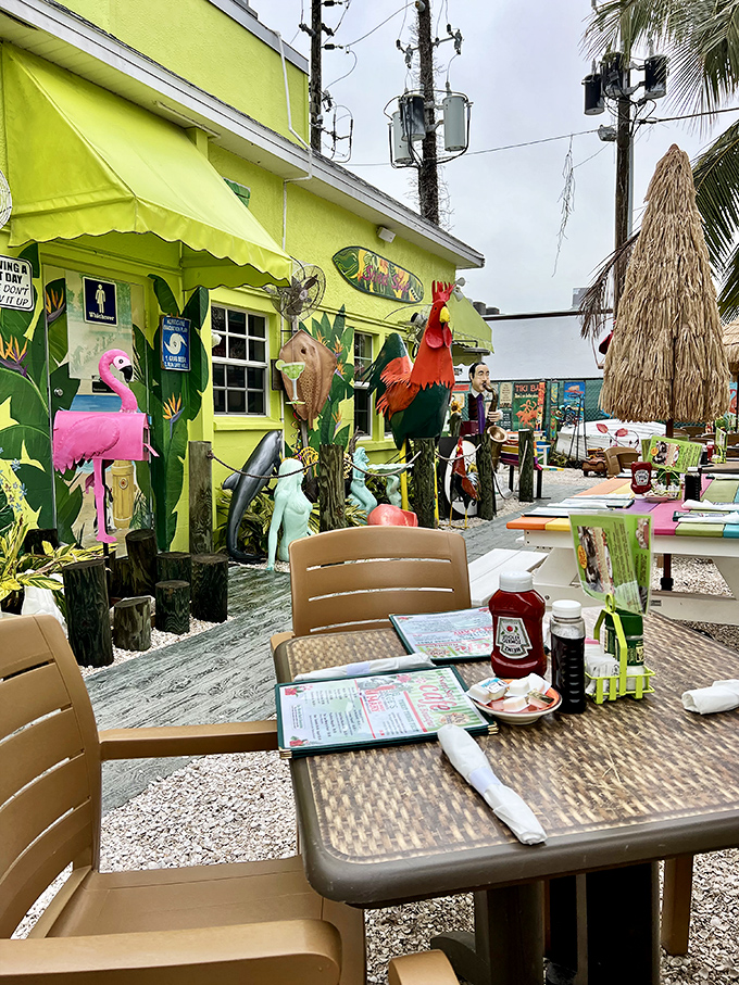 Outdoor dining where plastic flamingos and tropical decor create the perfect Florida atmosphere for enjoying breakfast with a side of vitamin D.