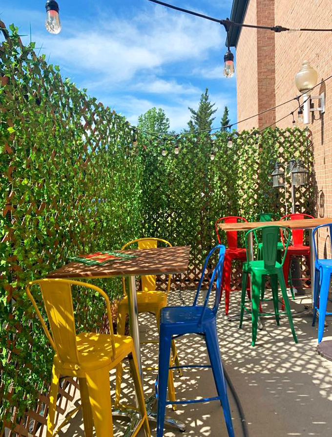 The patio's rainbow furniture creates an instant mood lift. When Michigan's brief summer arrives, this colorful outdoor space becomes the hottest real estate in Livonia.