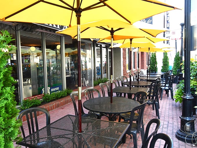 When Chicago weather cooperates, the outdoor seating becomes prime real estate. Yellow umbrellas create sunny spots even on cloudy days.