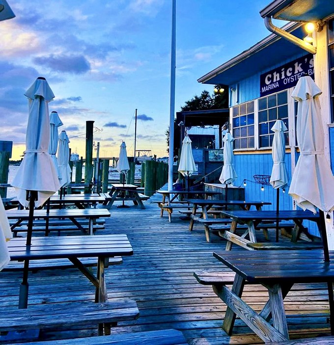 As evening falls, the deck transforms into a magical blue-hour haven where food tastes better and life's problems seem delightfully distant.