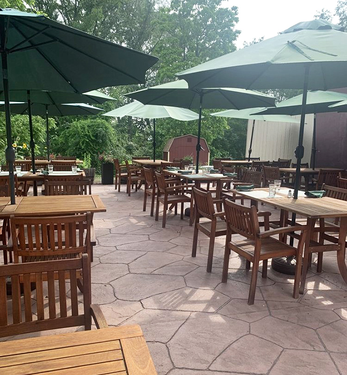 The outdoor patio where summer evenings stretch into memory under umbrellas and stars &ndash; proving great steaks taste even better with fresh air.