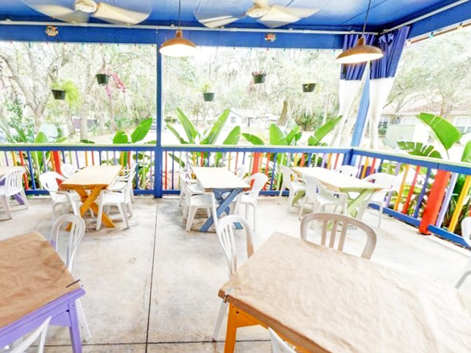 The colorful outdoor seating area feels like dining in a tropical garden&mdash;where Florida's natural beauty complements its culinary treasures.
