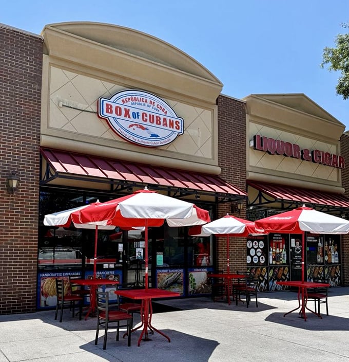 Outdoor seating under red and white umbrellas&mdash;because sometimes sandwiches this good deserve to be enjoyed with a side of sunshine and people-watching.