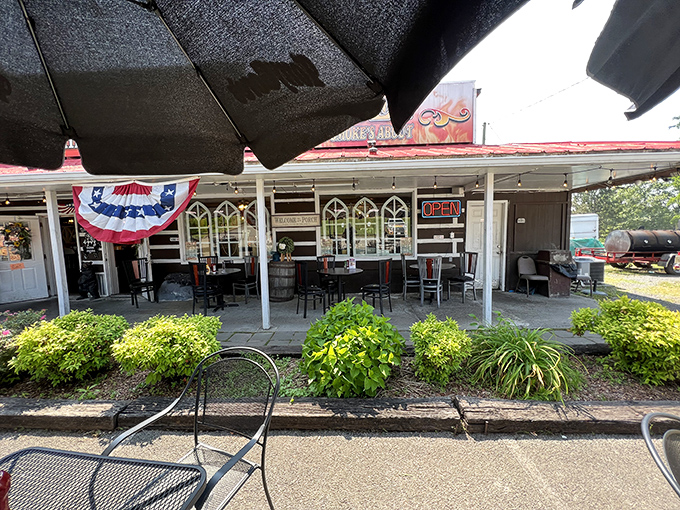 Even the outdoor seating area invites you to linger, with patriotic touches and greenery framing your approach to BBQ paradise.