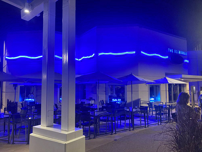 As evening falls, The Oceanaire's exterior glows with cool blue light&mdash;like an underwater grotto beckoning you in from Orlando's heat.