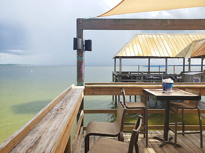 The view that comes complimentary with every meal – Lake Weir stretching to the horizon, making ordinary Tuesday lunches feel like vacation.