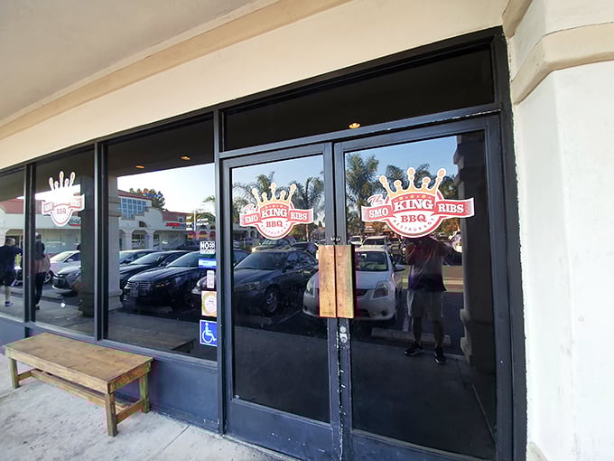 The entrance that separates the barbecue-curious from the barbecue-converted. That simple wooden bench outside is for those too impatient to wait in their cars.