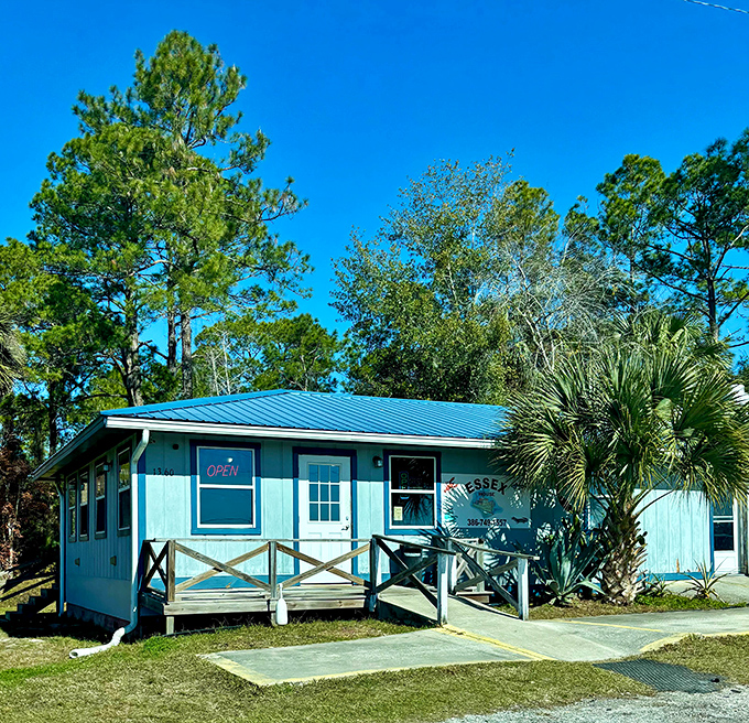 Under Florida's blue skies, the aqua-colored building promises seafood salvation to those wise enough to stop.