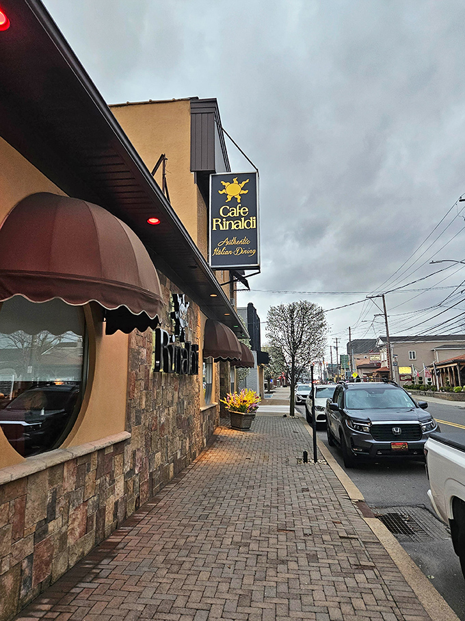 Even from the sidewalk, Caf&eacute; Rinaldi's warm glow spills onto the brick pavers, offering a preview of the comfort waiting inside.