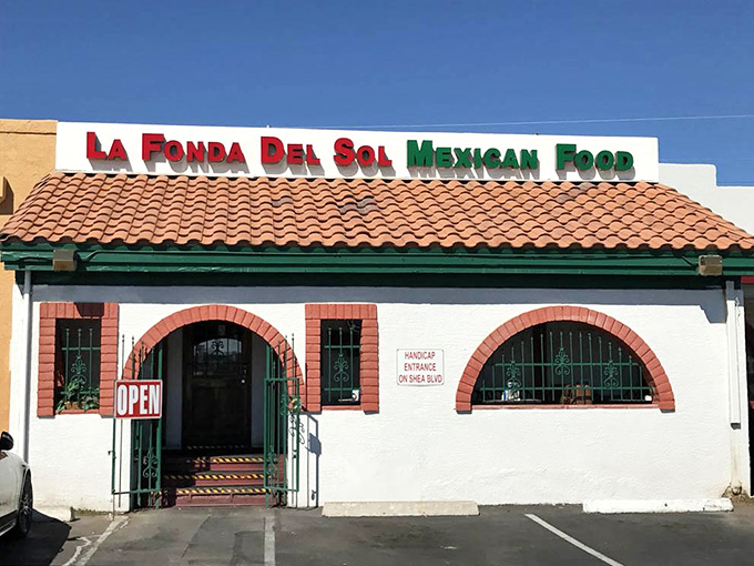 Architectural details that transport you south of the border before you've even stepped inside. That "OPEN" sign is one of Scottsdale's most welcome sights.