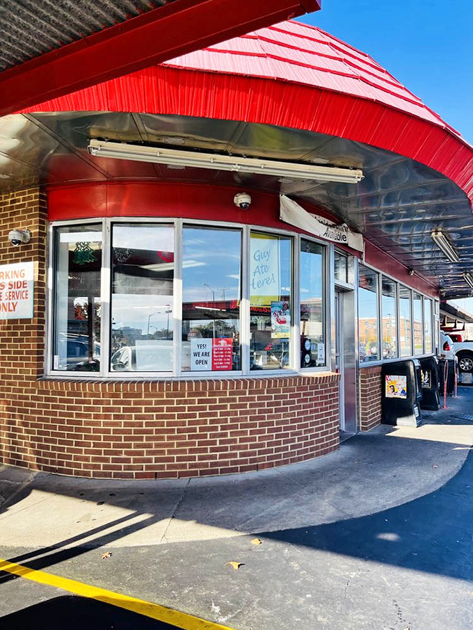 That curved brick exterior with its distinctive red awning isn't just architecture&mdash;it's a promise of consistency in a world that changes too quickly for comfort.