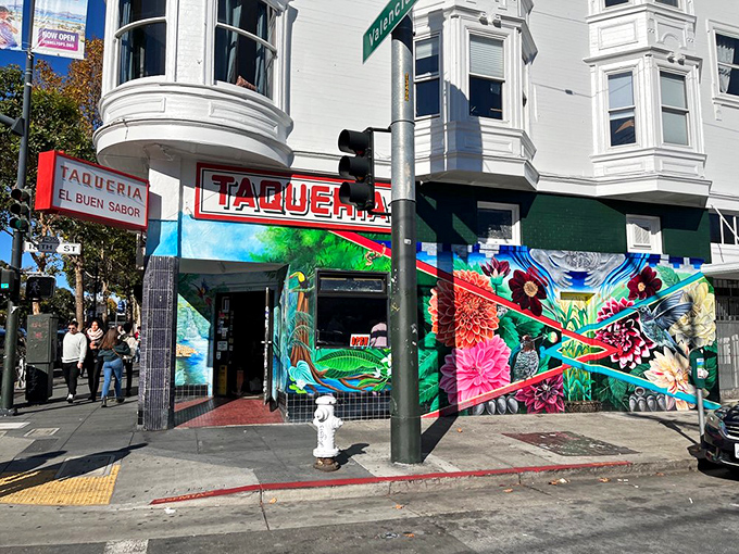 The colorful exterior mural serves as a beacon to burrito seekers. This corner has fueled more San Franciscans than coffee and sourdough combined.