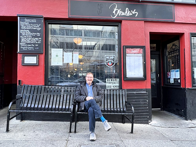 The bench outside isn't just seating &ndash; it's where anticipation builds before the flavor explosion that awaits inside Brenda's welcoming doors.