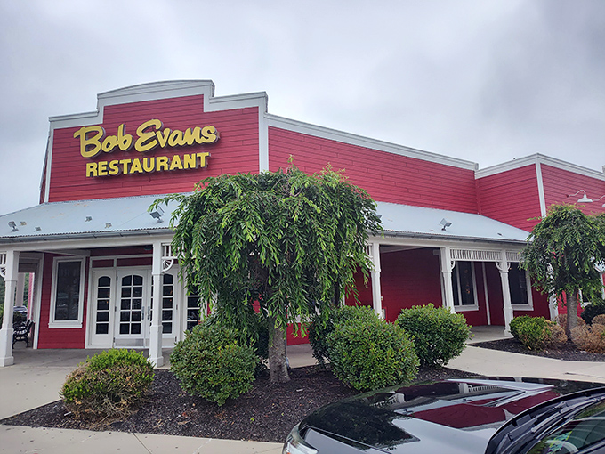 That cheerful red exterior isn't just a building &ndash; it's a landmark for road-weary travelers seeking the comfort of a reliable meal.