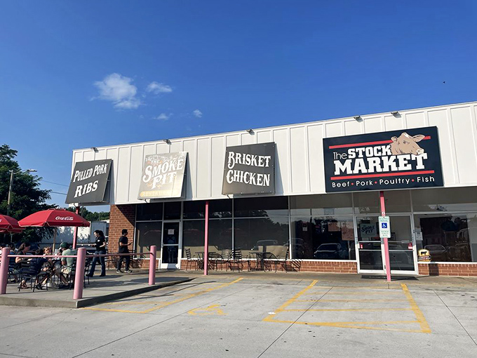 The exterior view that beckons meat lovers like a lighthouse guides ships. Those signs aren't just advertising – they're promises kept.