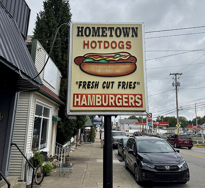 That sign says it all&mdash;"Fresh Cut Fries" isn't just a slogan, it's a solemn promise. The hot dog illustration looks like it's winking at hungry passersby.